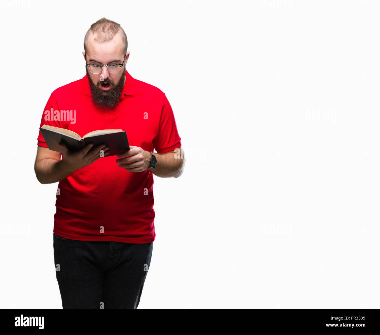 Man in library reading book Cut Out Stock Images & Pictures - Alamy