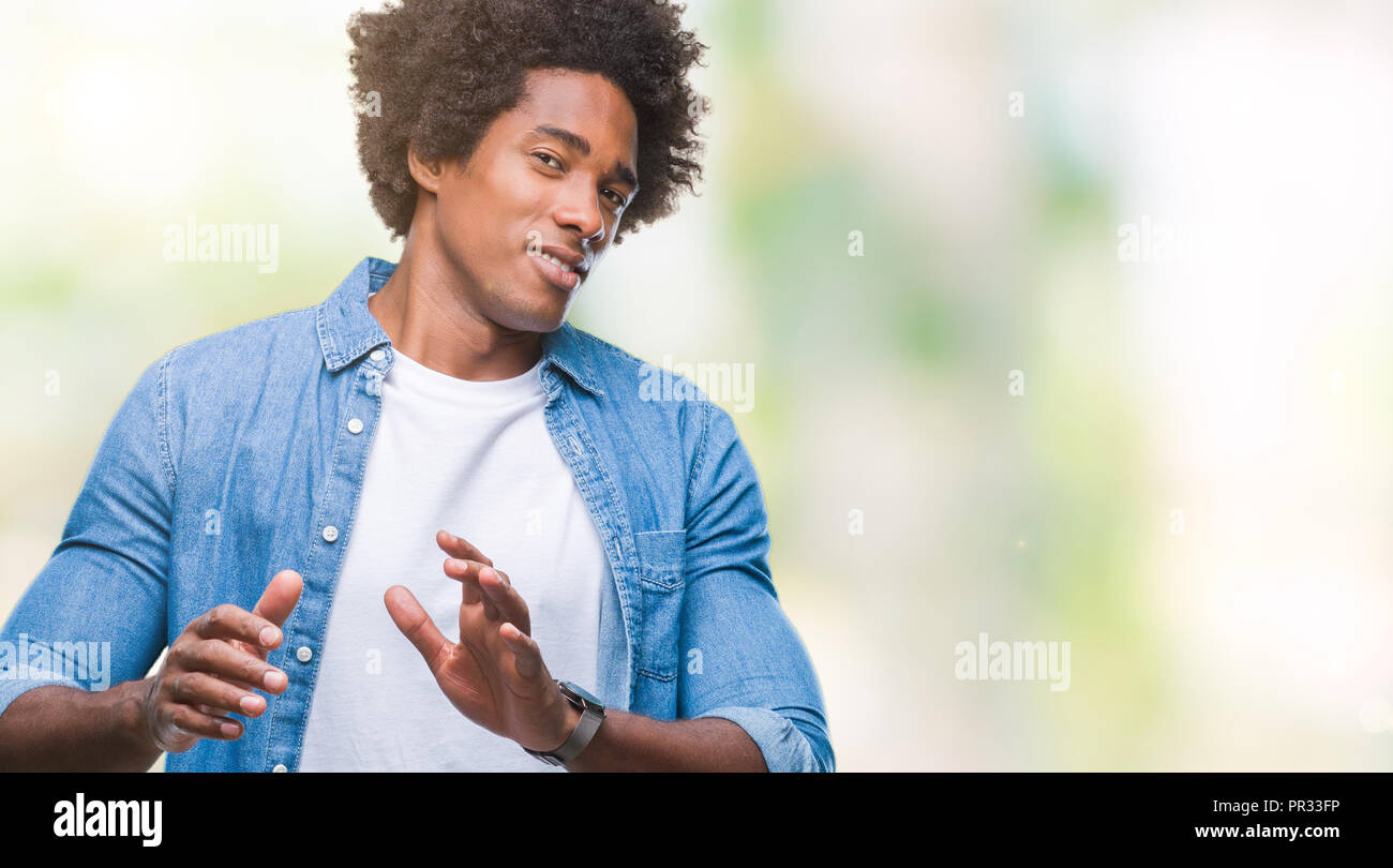 Afro american man over isolated background disgusted expression ...
