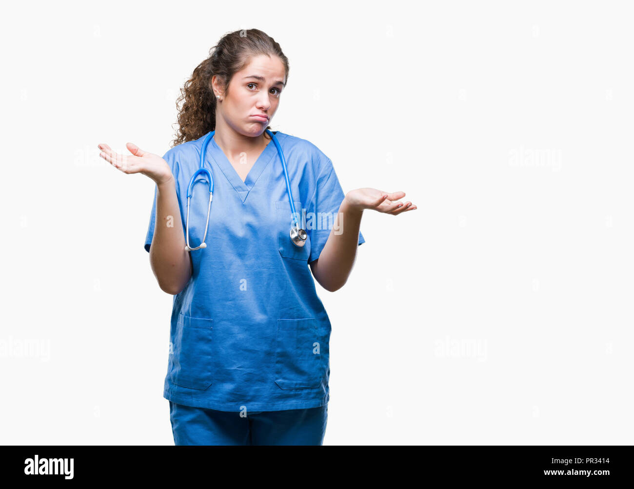 Young brunette doctor girl wearing nurse or surgeon uniform over ...
