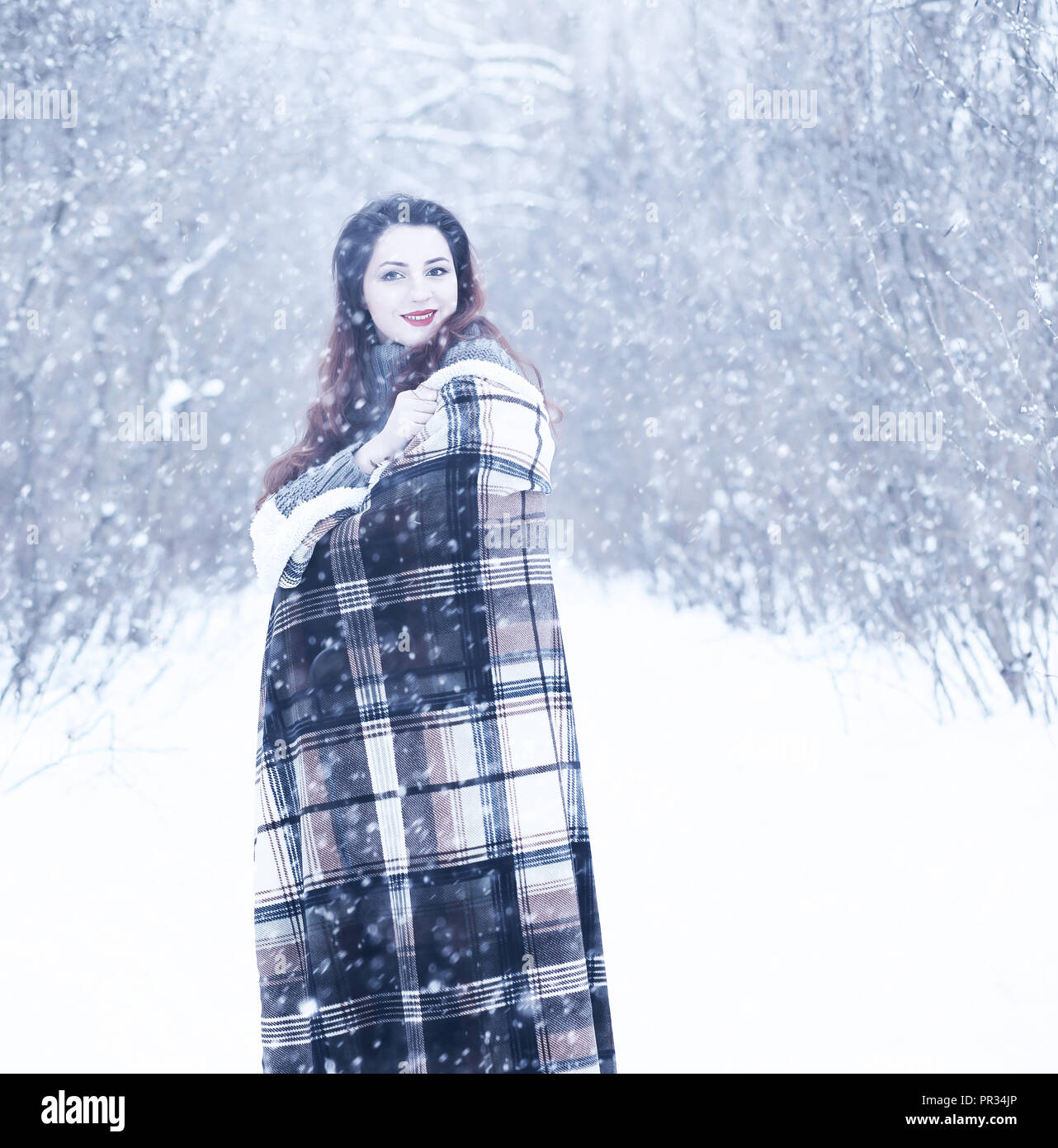 Beautiful girl in a beautiful winter snow Stock Photo - Alamy