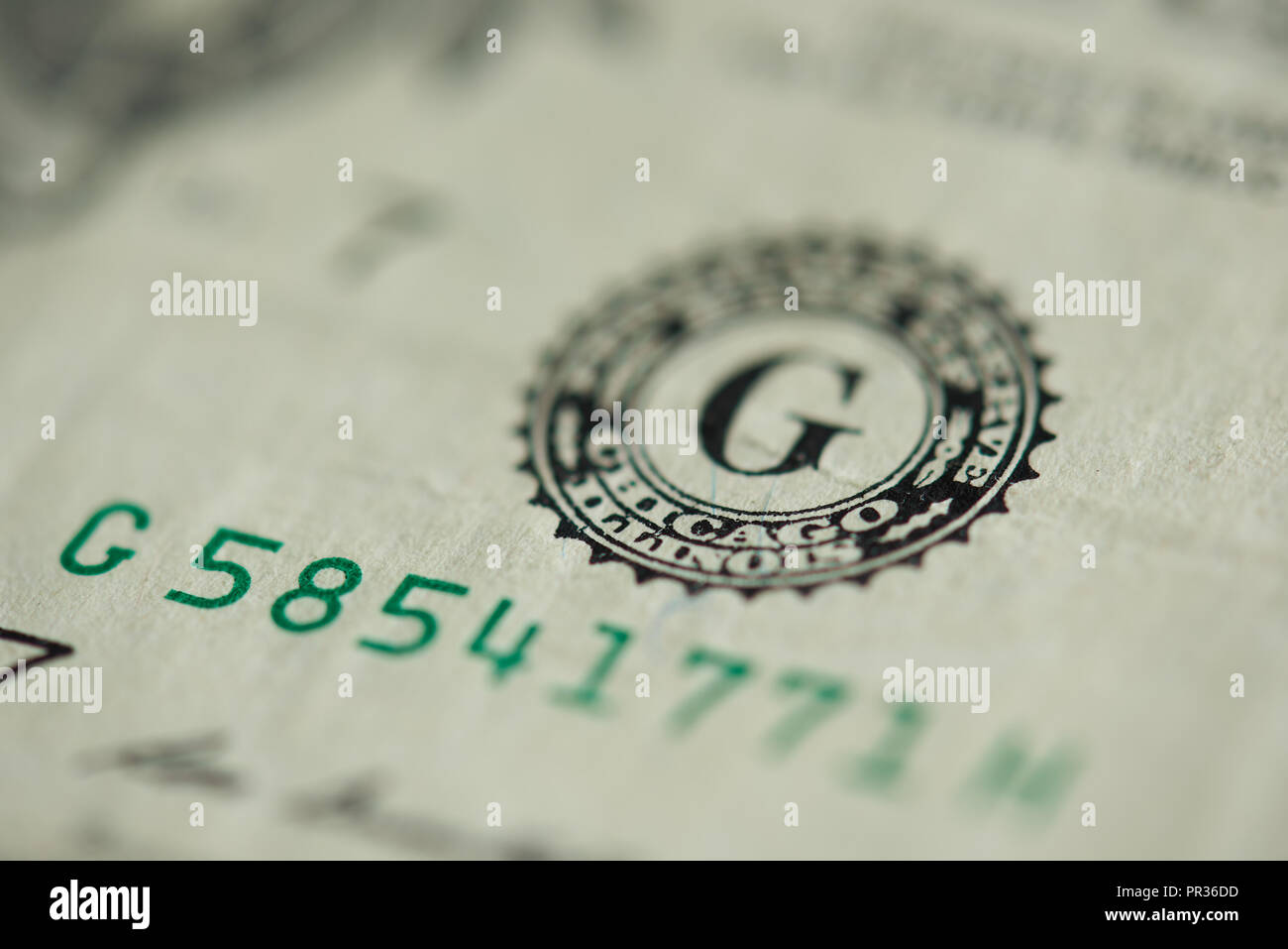 Stamp with green number on dollar banknote close up view Stock Photo ...