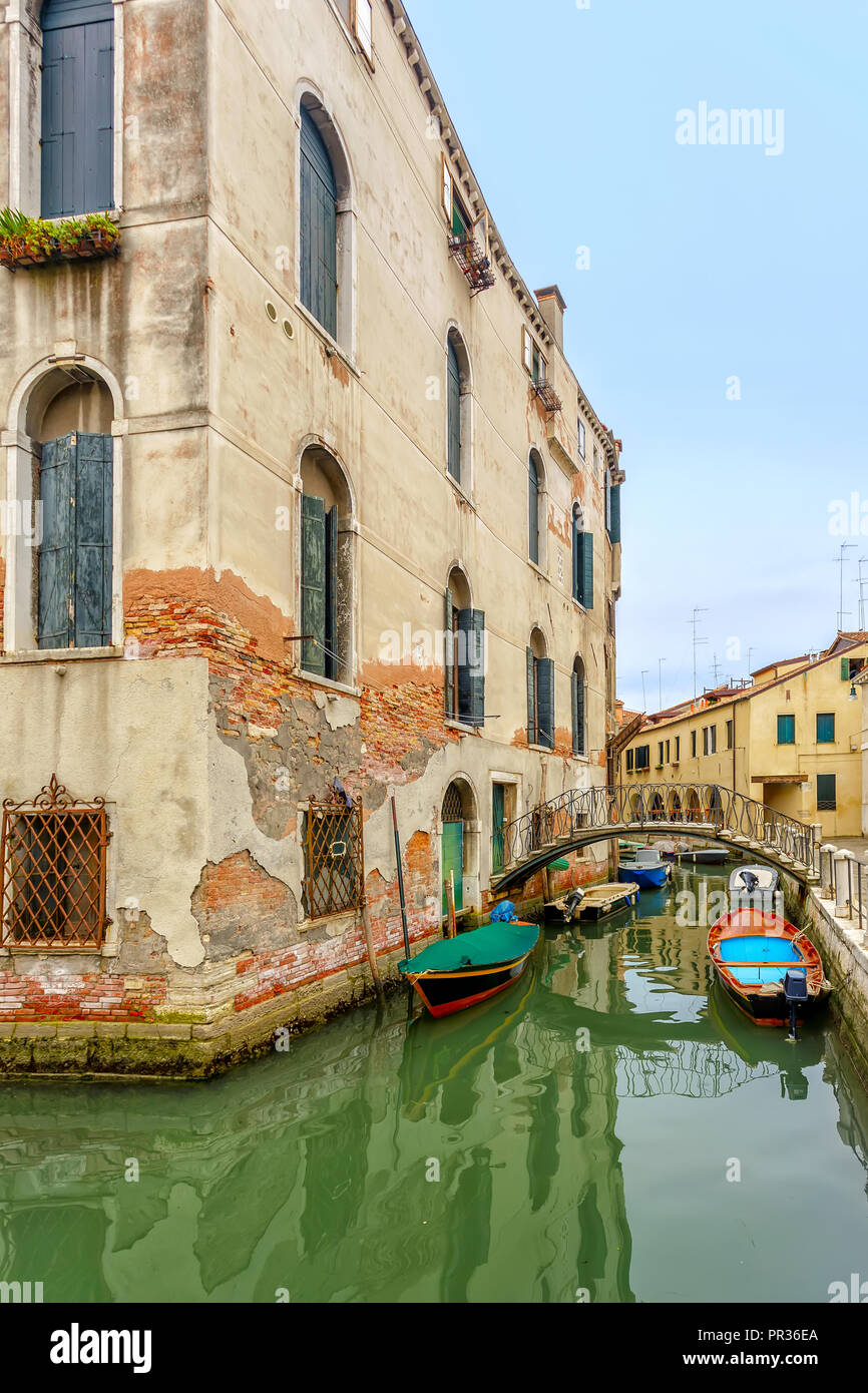 Venice canal with boats Italy Stock Photo - Alamy
