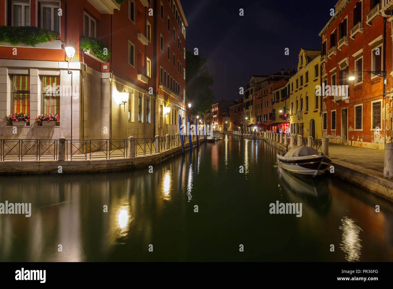 Narrow canal in Venice, Italy. Night view Stock Photo - Alamy
