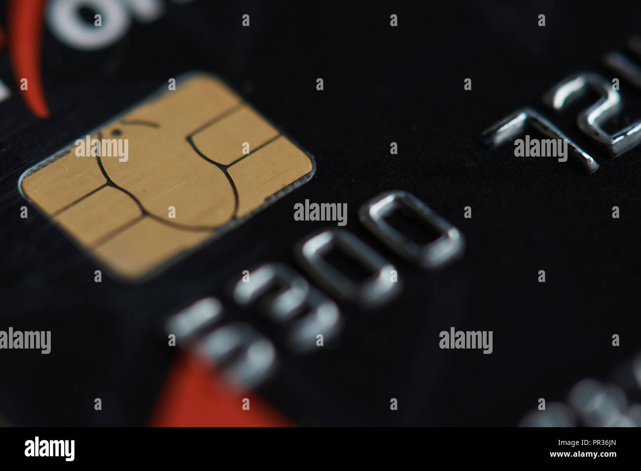Close up of credit card chip on black background Stock Photo - Alamy