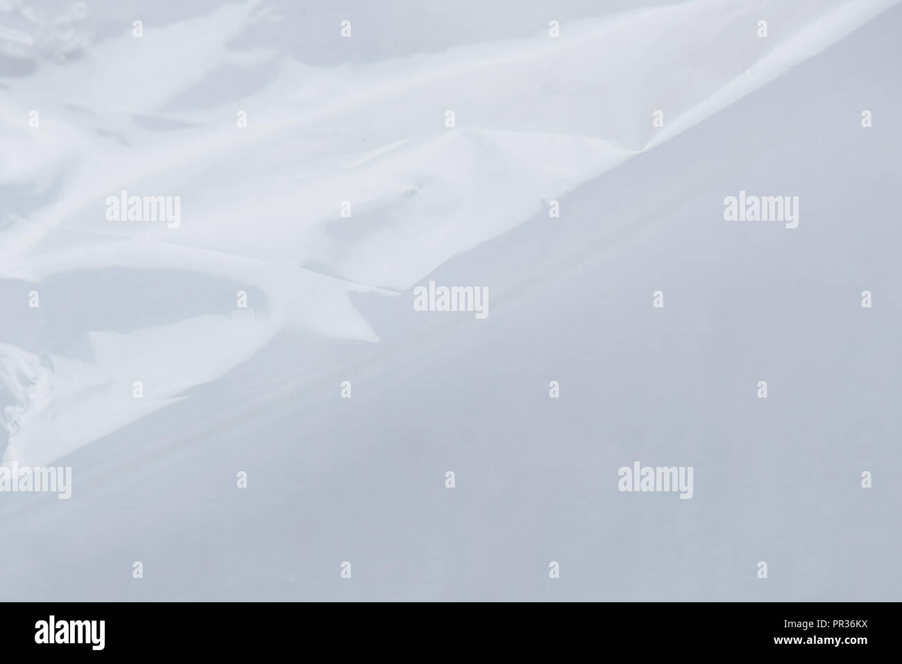 White plastic texture background. Surface of wrinkled recycle polythene ...