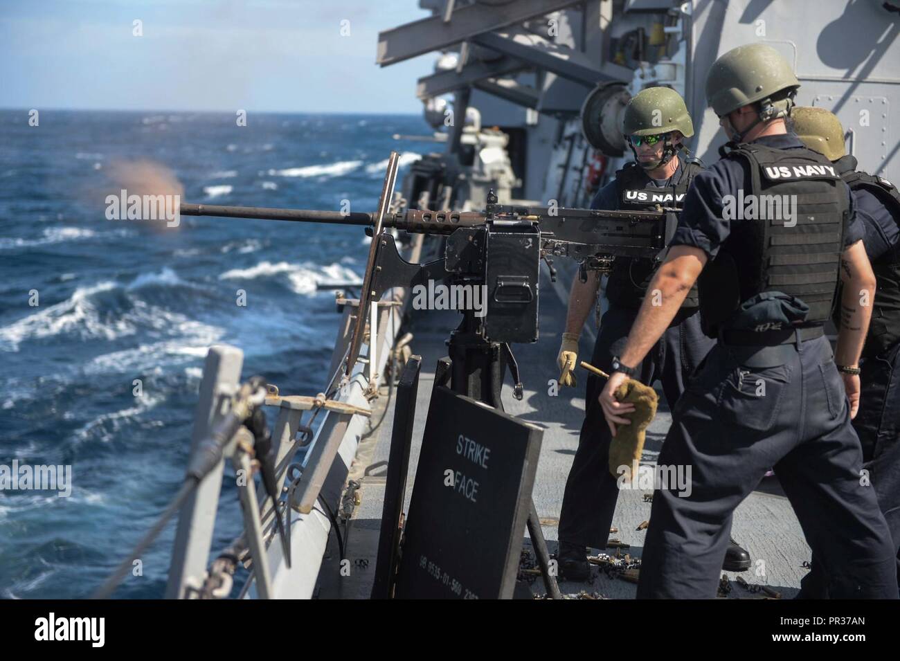 OCEAN (July 28, 2017) Sailors instruct midshipmen on how to fire the ...
