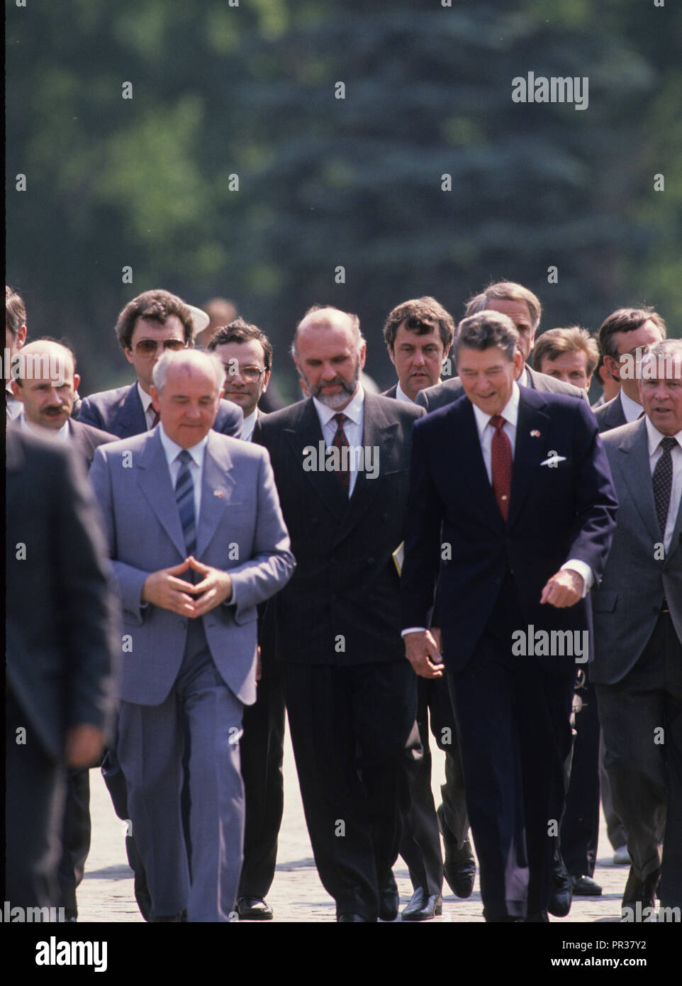 President Ronald Reagan and General Secretary Gorbachev walk and talk ...