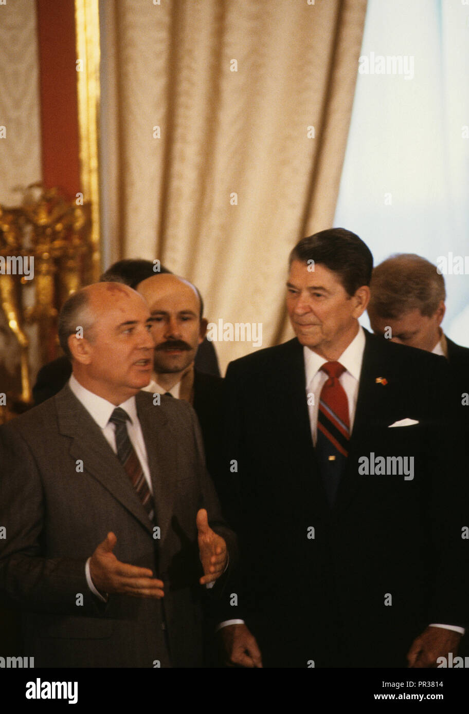 President Ronald Reagan and General Secretary Gorbachev talk during a ...