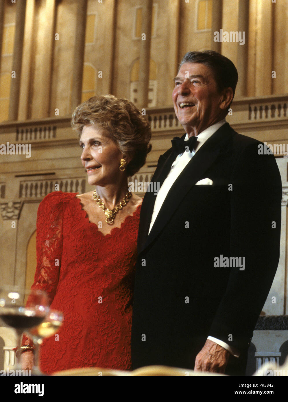 President Ronald Reagan and First Lady Nancy Reagan at a dinner in ... President Ronald Reagan and First Lady Nancy Reagan at a dinner in ...