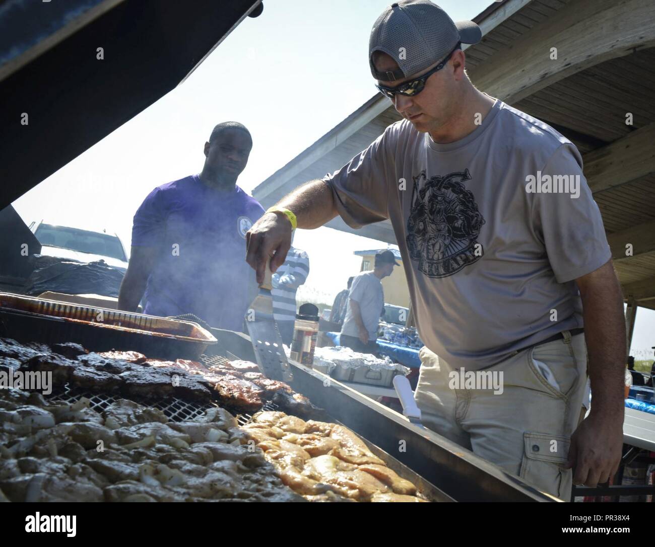 MAYPORT, Fla. (July 28, 2017) Chief Boatswain’s Mate Devon Seitz grills ...