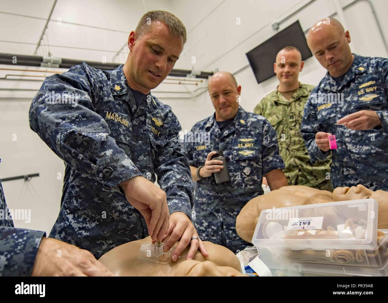 (July 31, 2017)— Instructors observe Lt. Cmdr. Patrick Magajna, a ...