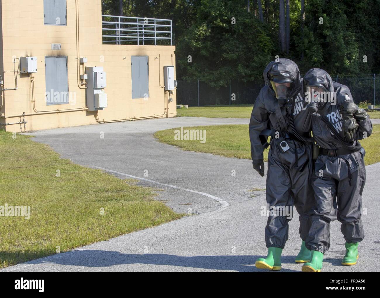 U.S. Marine Corps Cpl. Brookelyn A. Whipple (right), a chemical ...