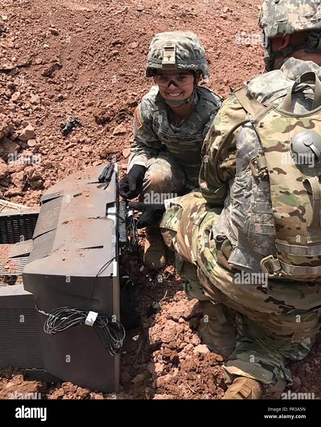 Sgt. Brittany Wildman sets a C4 explosive charge as part of her cavalry ...