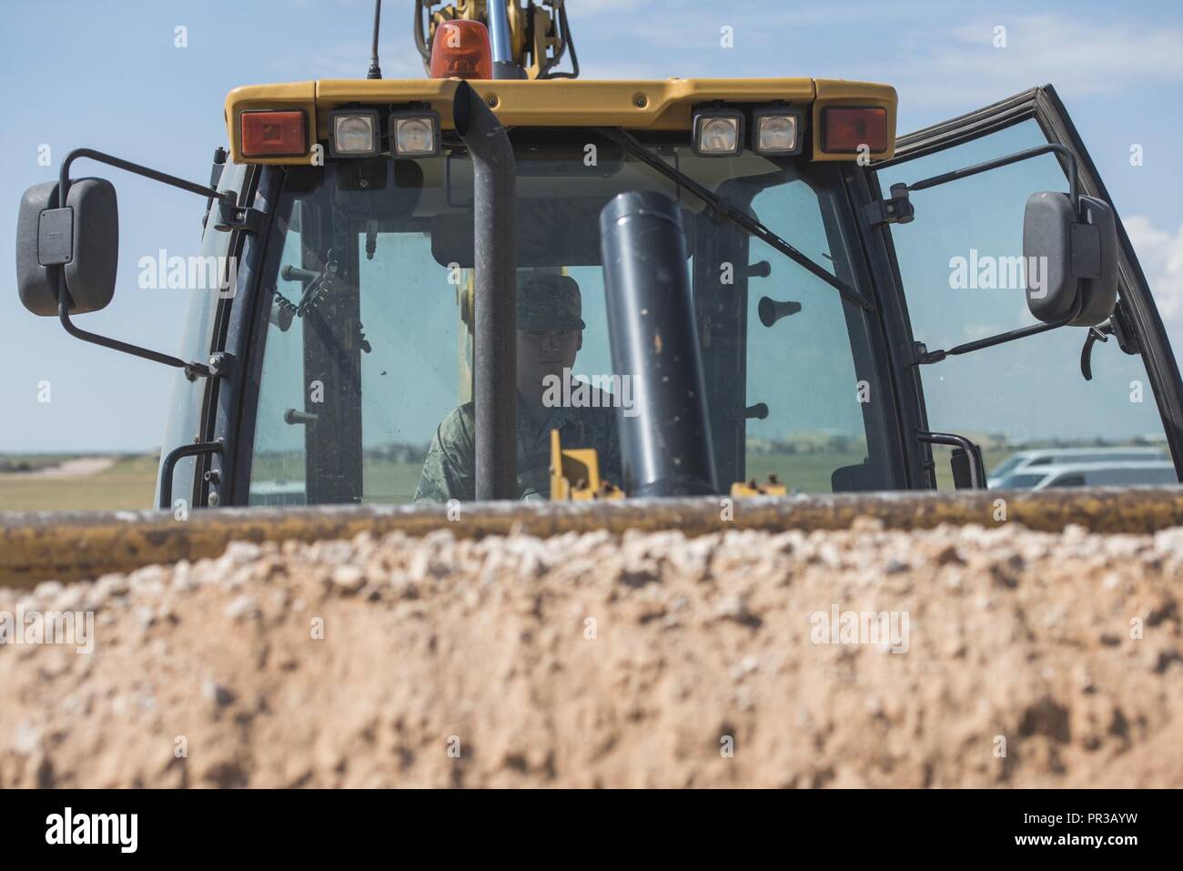 Cadet 2nd Class Tom Cox, Air Force Academy cadet, operates the controls ...