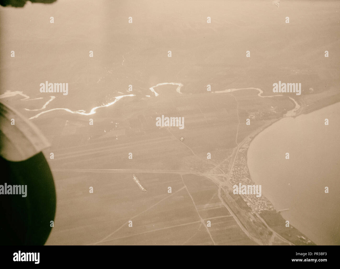 Air views. High view of Jordan out-flow fr[om] Galilee showing Semach ...
