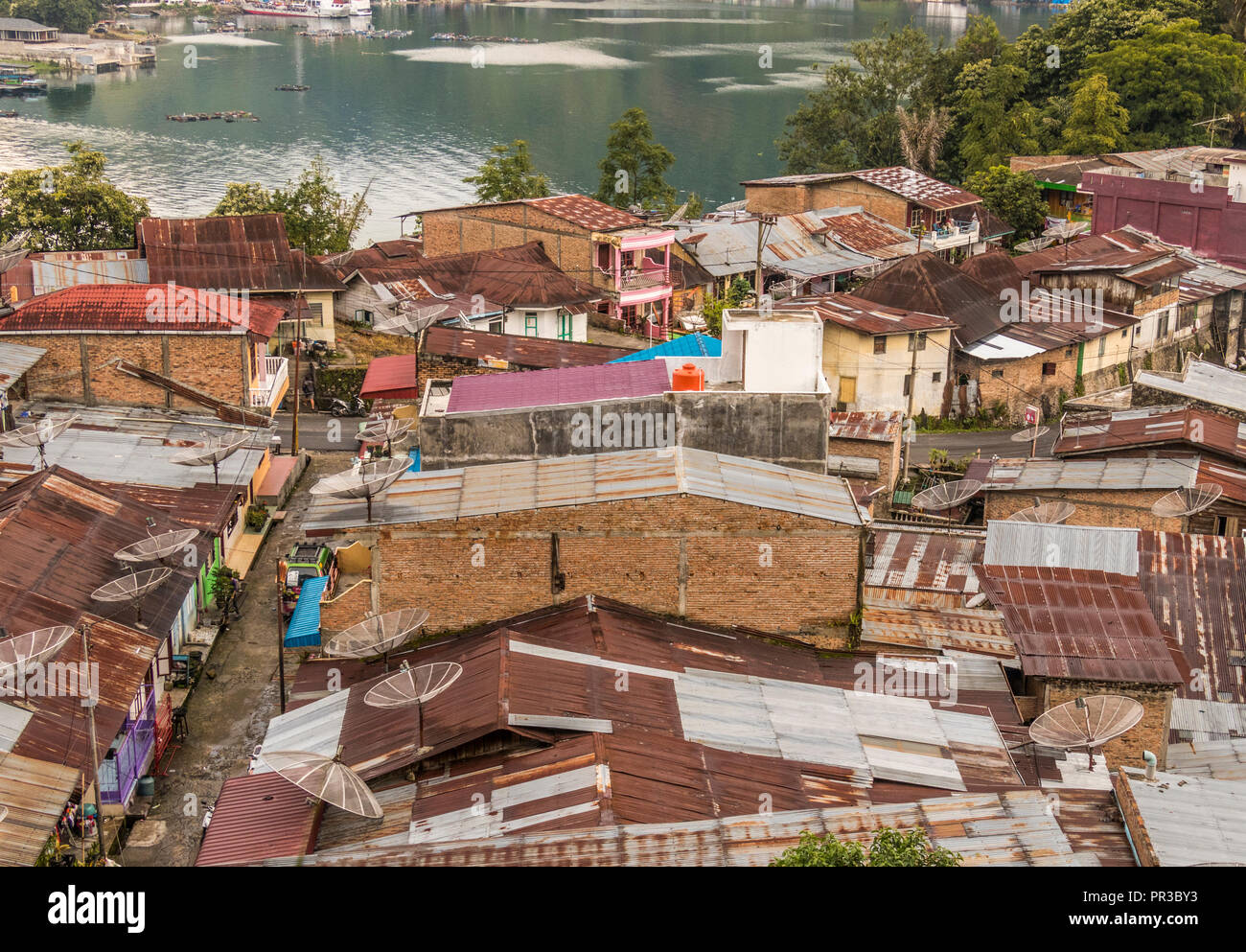 Parapat coastal town on banks of Lake Toba in the Uluan Peninsula ...