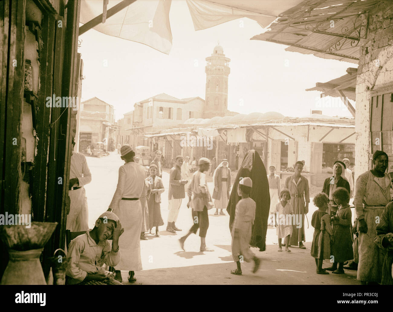Majdel village & its primitive weaving. Majdel market showing town ...