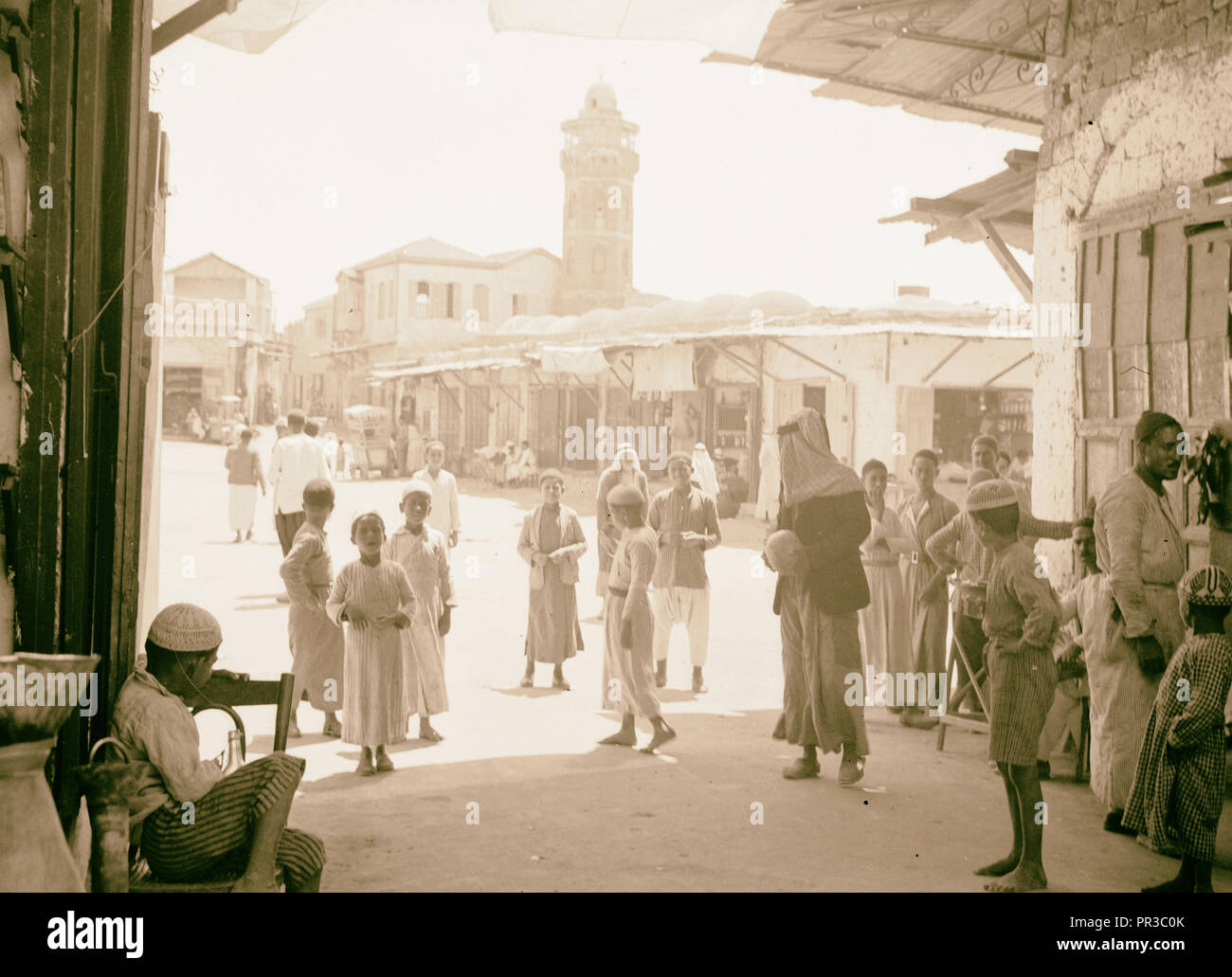 Majdel village & its primitive weaving. Majdel market showing town ...