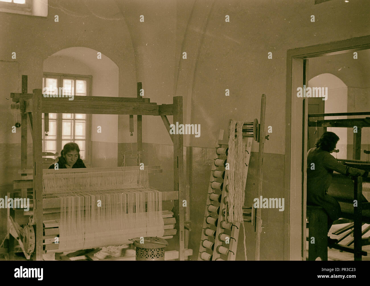 Women's Institute, One of the weaving rooms, 1 loom looking through ...
