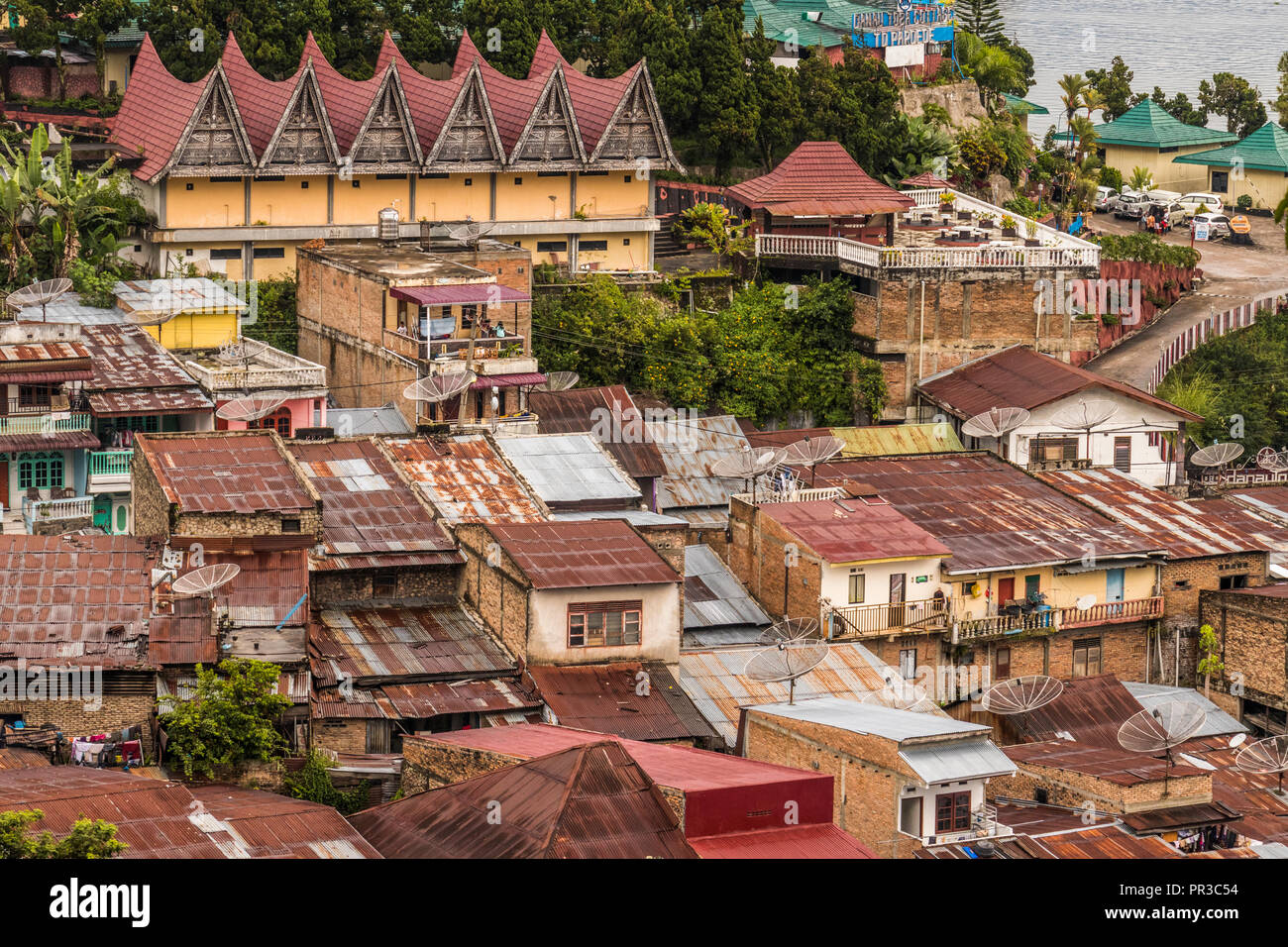 Parapat coastal town on banks of Lake Toba in the Uluan Peninsula ...