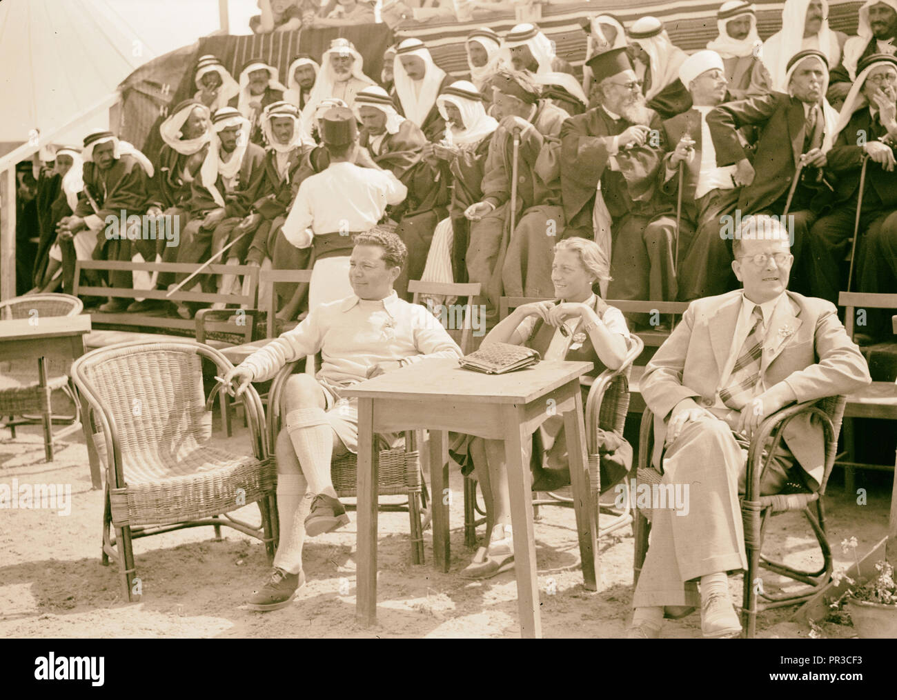 Race meeting (horse & camel). Beersheba. Crowds around the grand stand ...