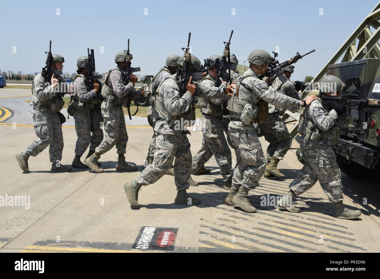 The 39th Security Forces Squadron moves into the area by using an ...