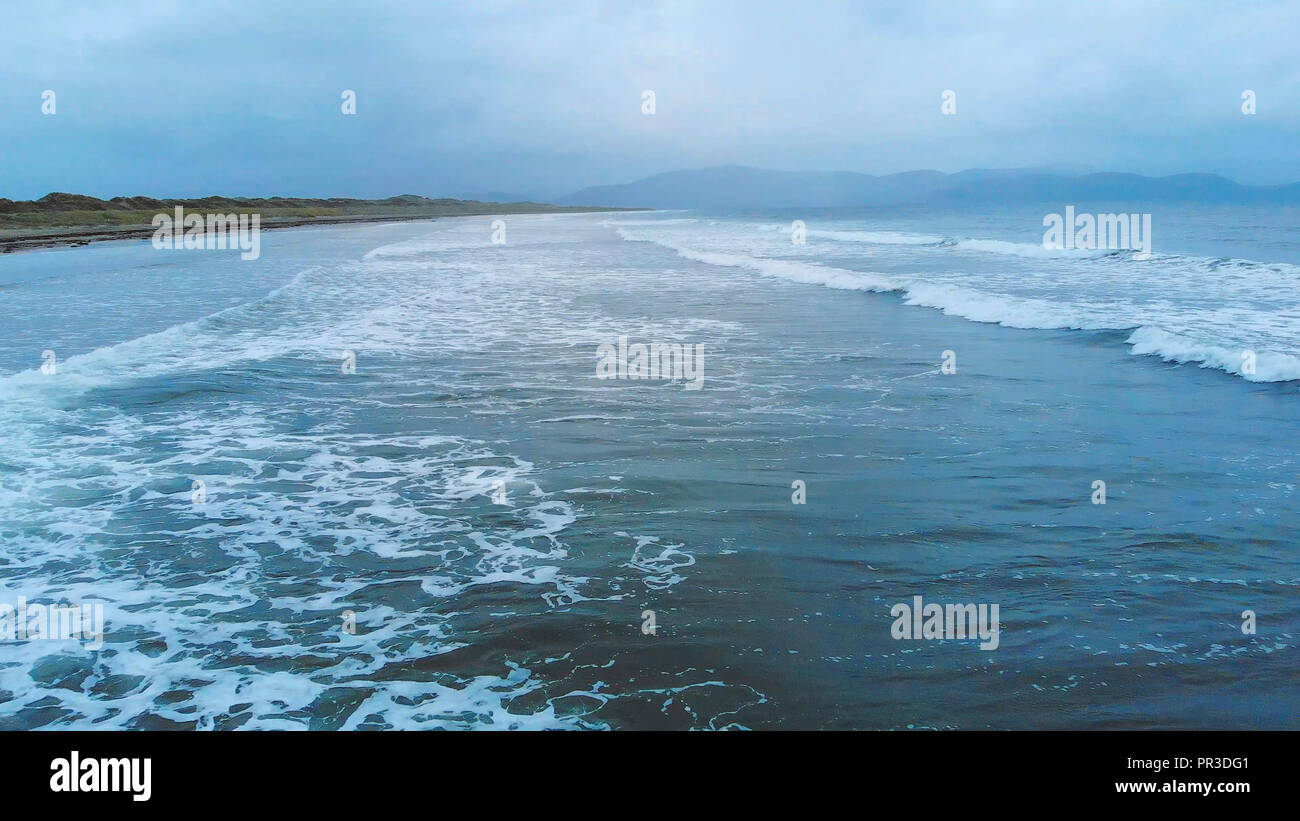 Amazing Aerial view over an endless beach in the evening Stock Photo ...