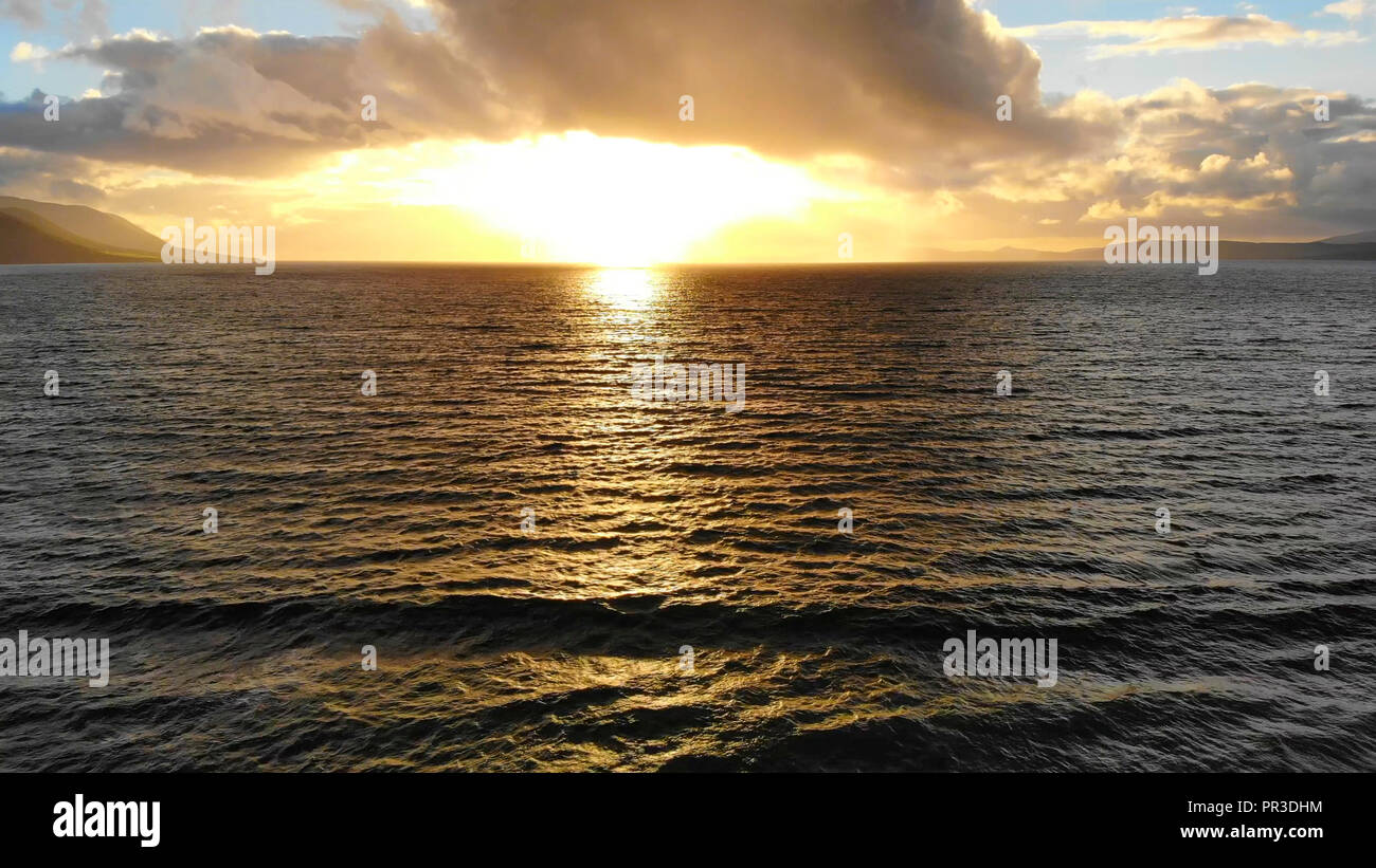 Drone flight over ocean peninsula hi-res stock photography and images ...