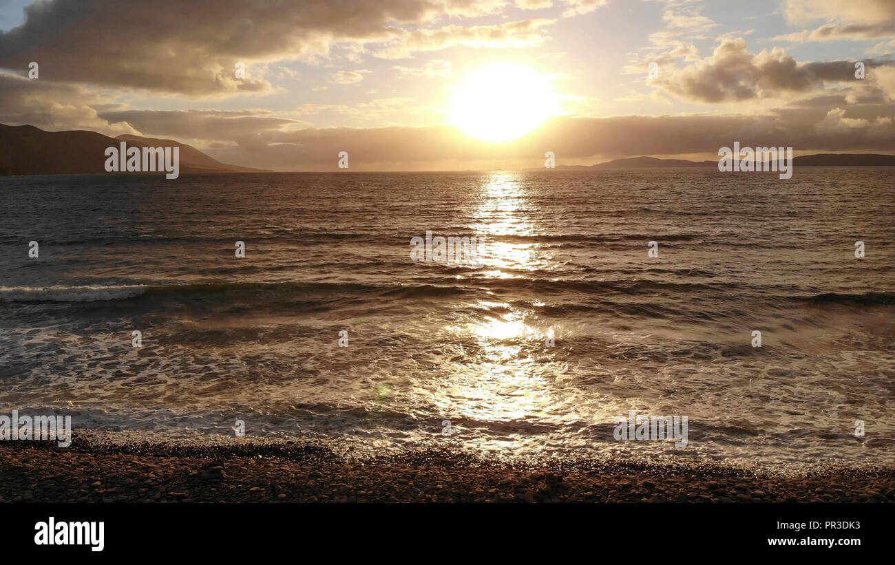 Flight over rocky island sea hi-res stock photography and images - Alamy