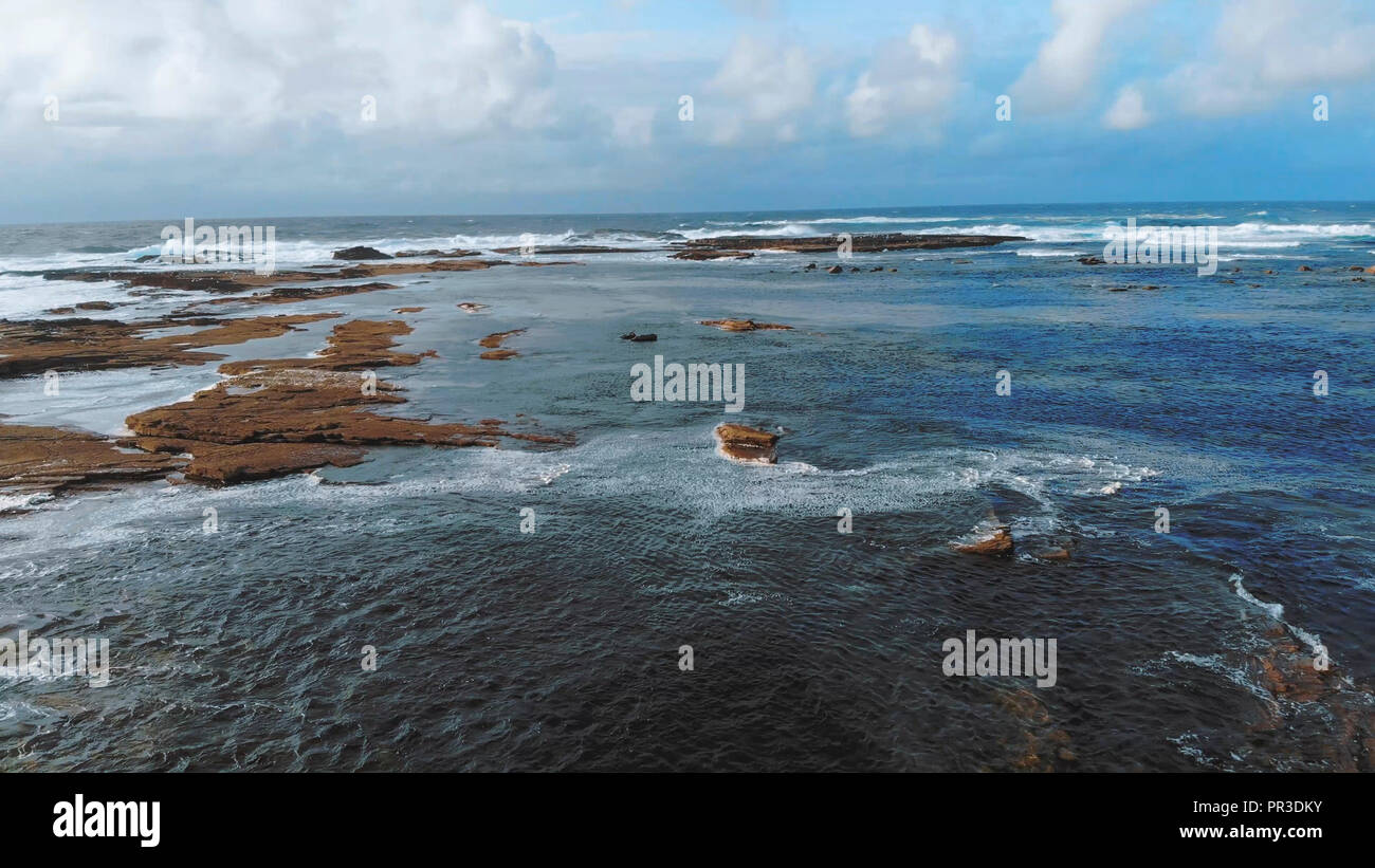 Aerial view over the blue ocean water at the Irish west coast Stock ...