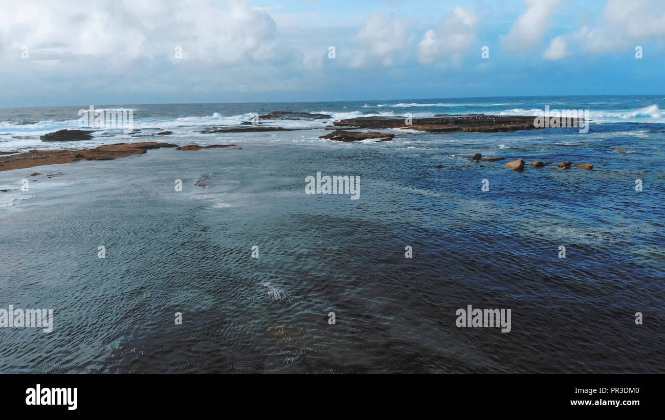Aerial view over the blue ocean water at the Irish west coast Stock ...