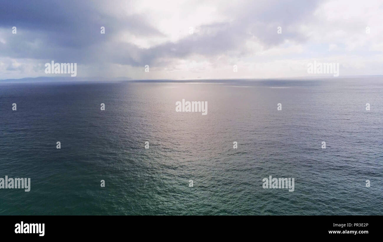 Drone flight over ocean peninsula hi-res stock photography and images ...