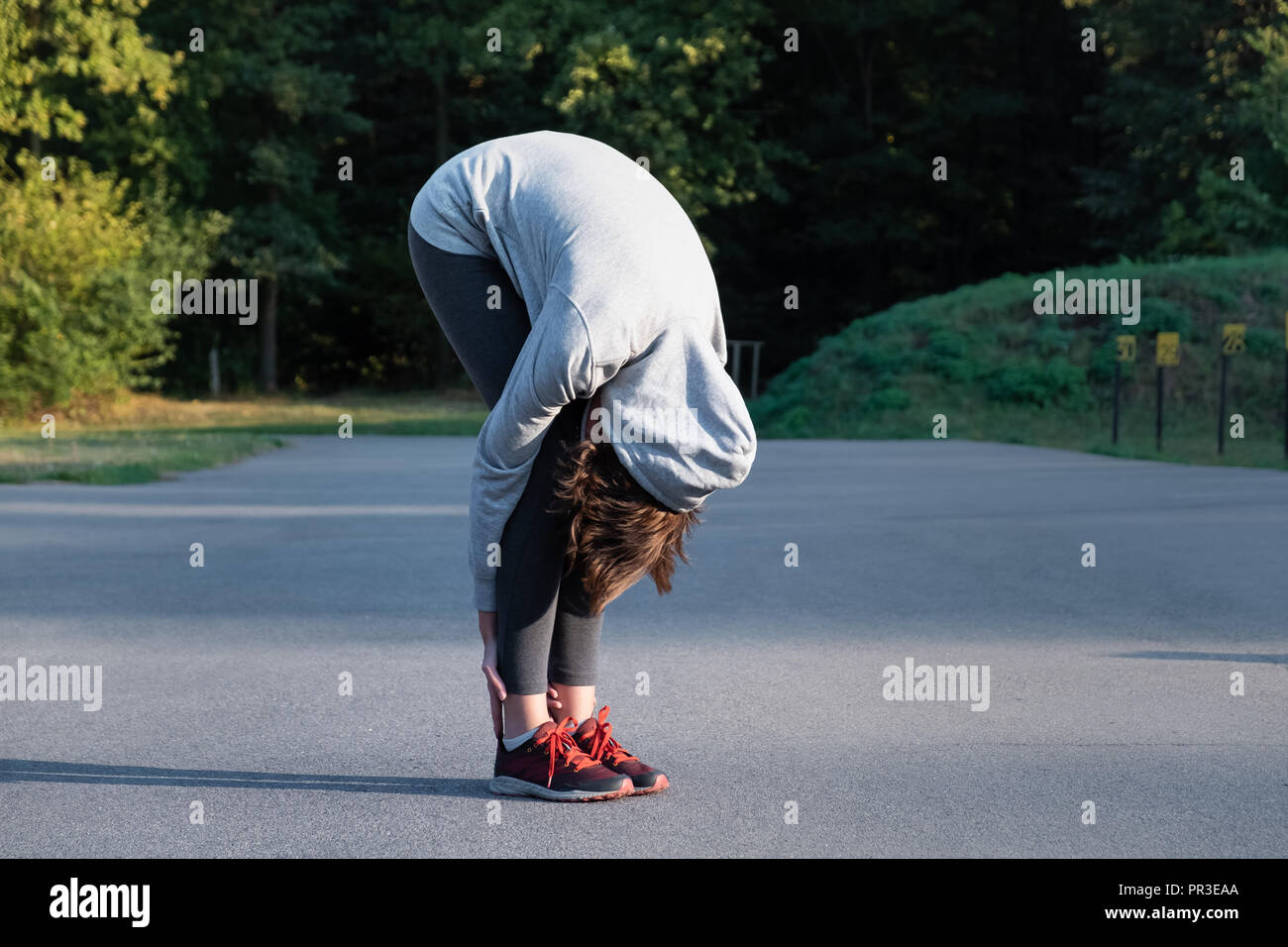 Person stretching hi-res stock photography and images - Alamy