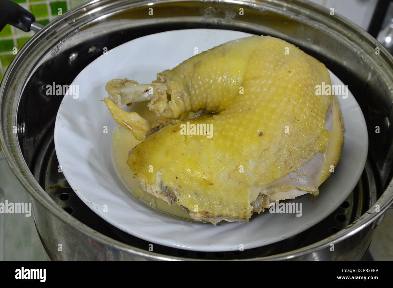 steamed chicken in steaming pot Stock Photo - Alamy