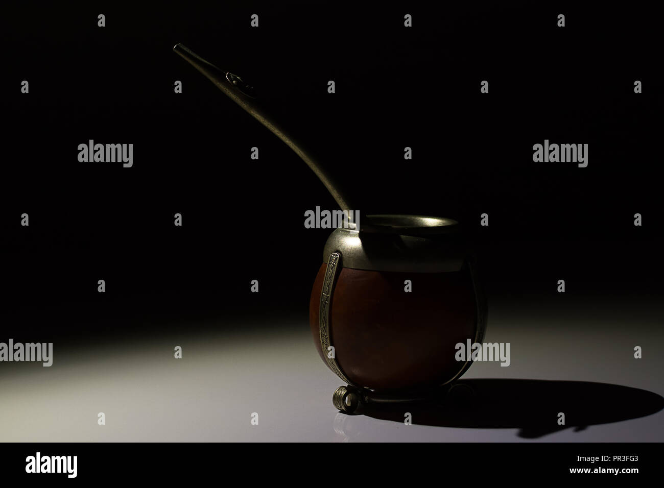 mate with bombilla in hight contrast with background Stock Photo - Alamy