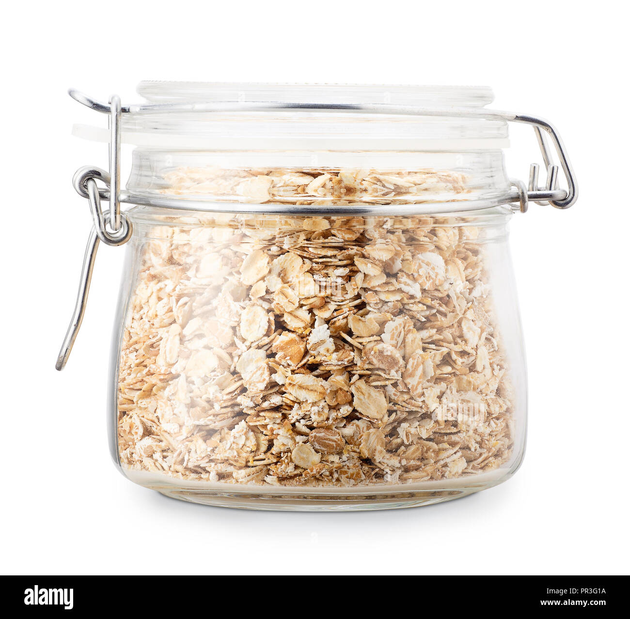 transparent glass jar with uncooked oatmeal flakes isolated on white ...