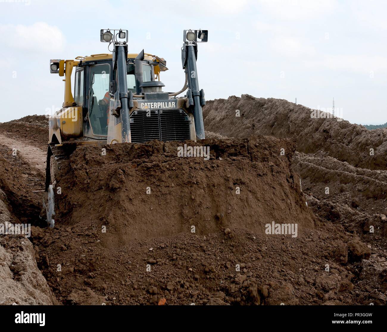 A Caterpillar D8T Bulldozer fitted with a semi universal blade and ...