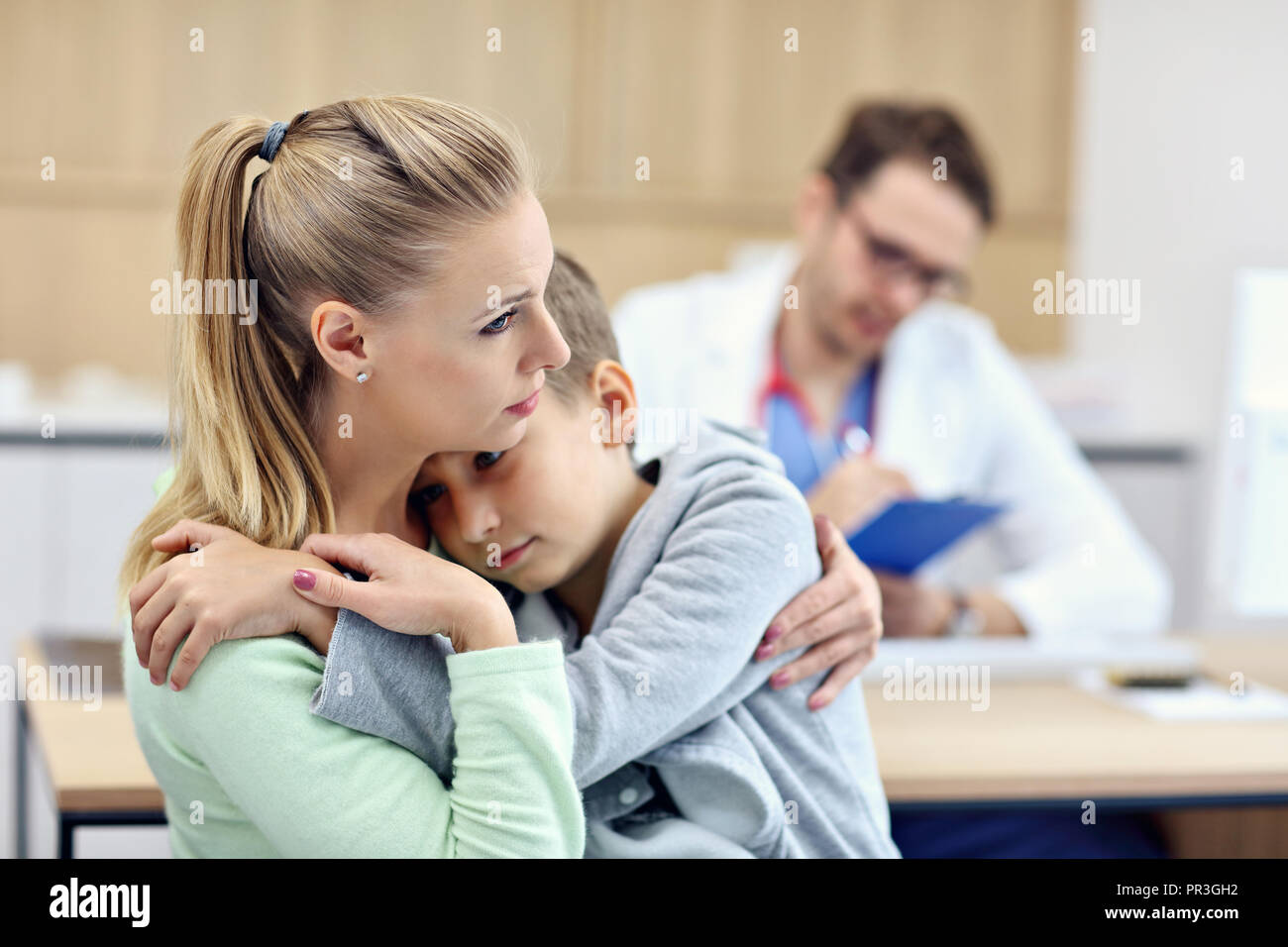 Doctor examination crying hi-res stock photography and images - Alamy