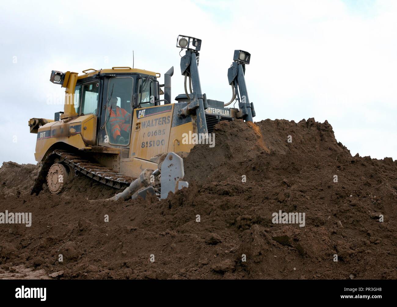 A Caterpillar D8T Bulldozer fitted with a semi universal blade and ...