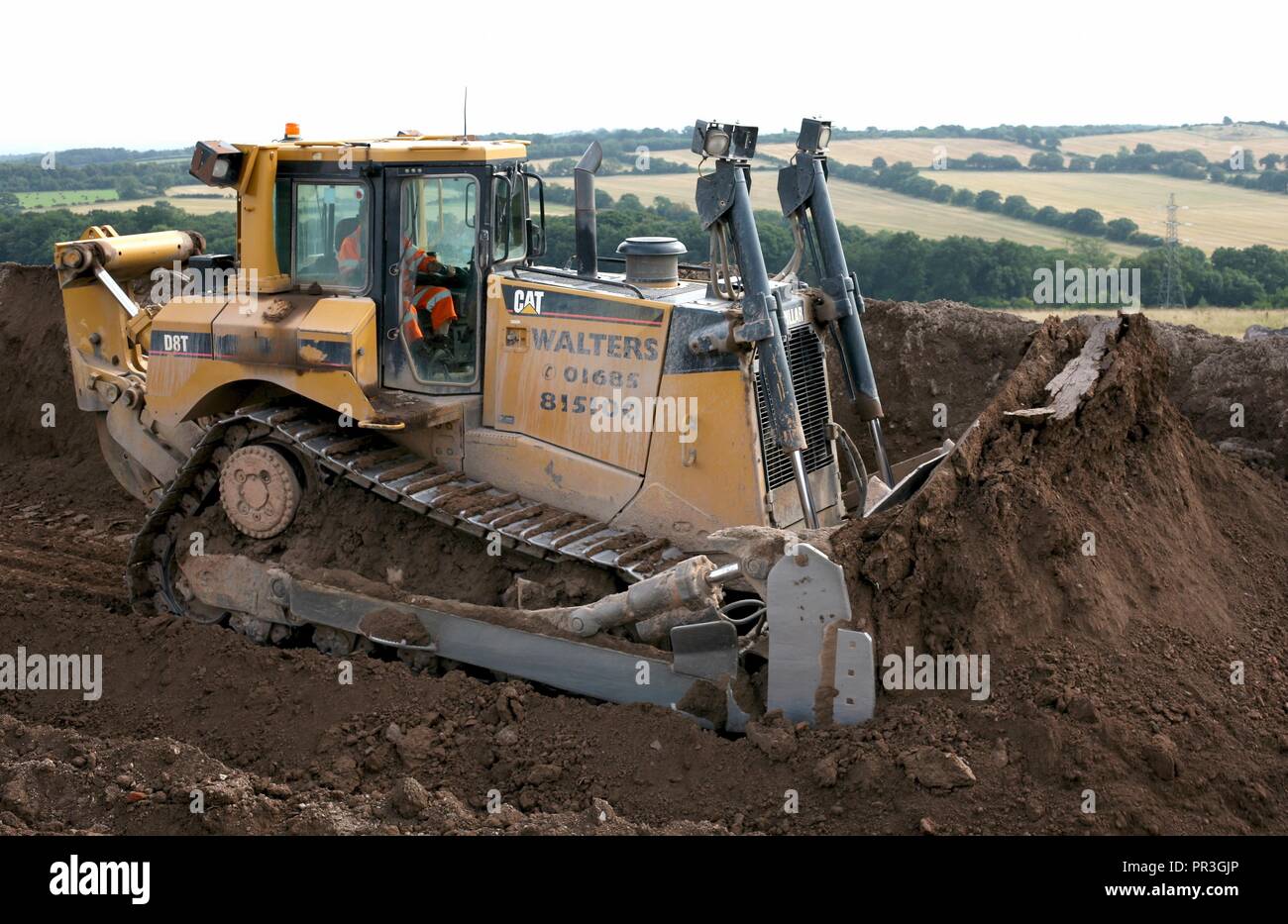 A Caterpillar D8T Bulldozer fitted with a semi universal blade and ...