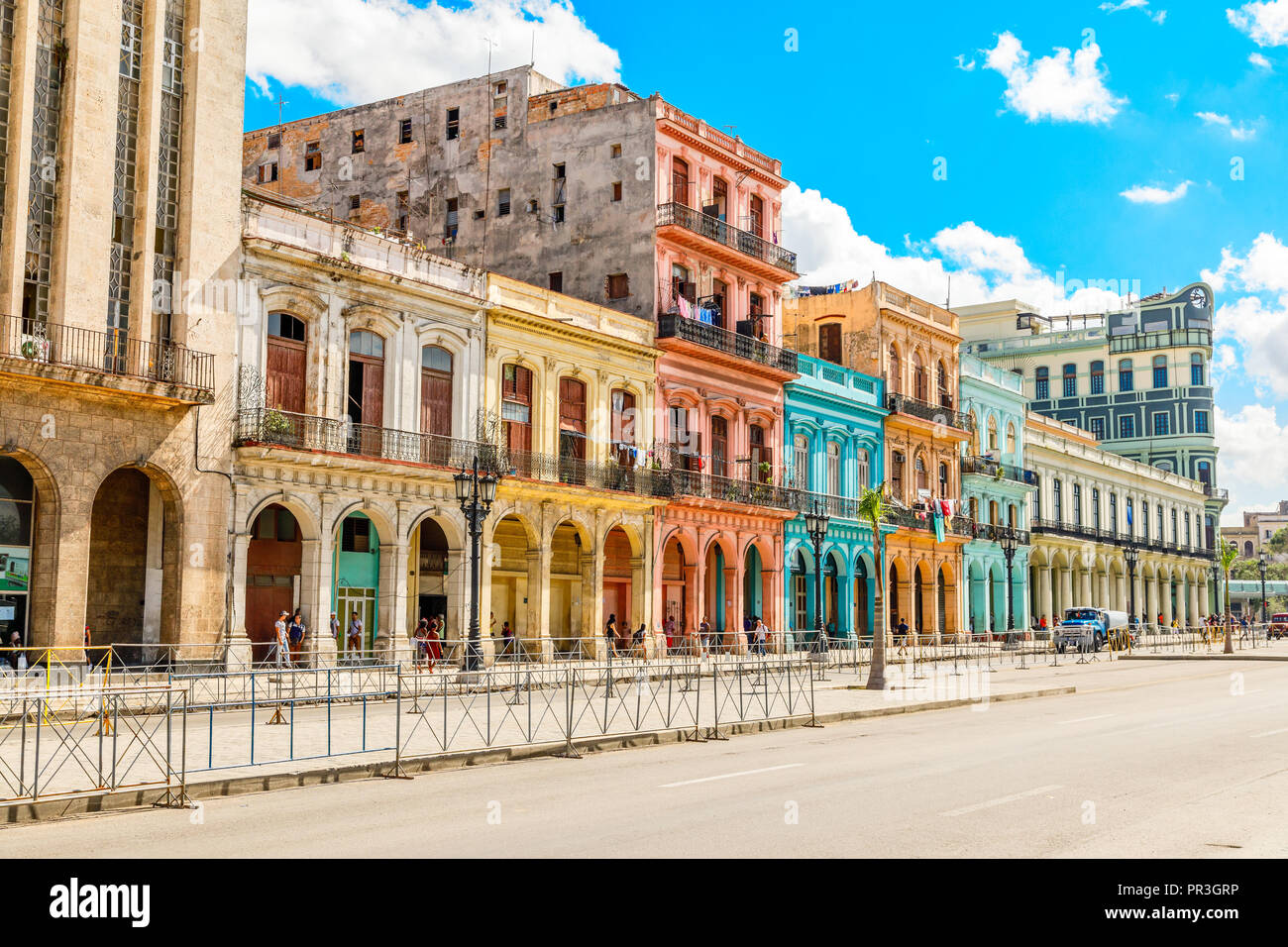 Old Spanish colonial living colorful houses across the road in the ...