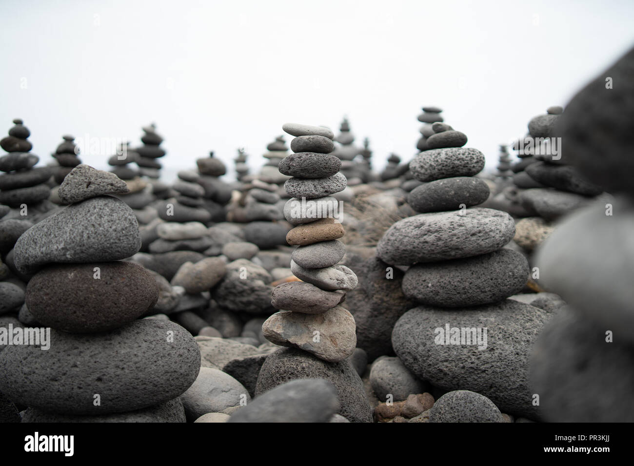 A pile of pebbles is built in the form of a pyramid Stock Photo - Alamy