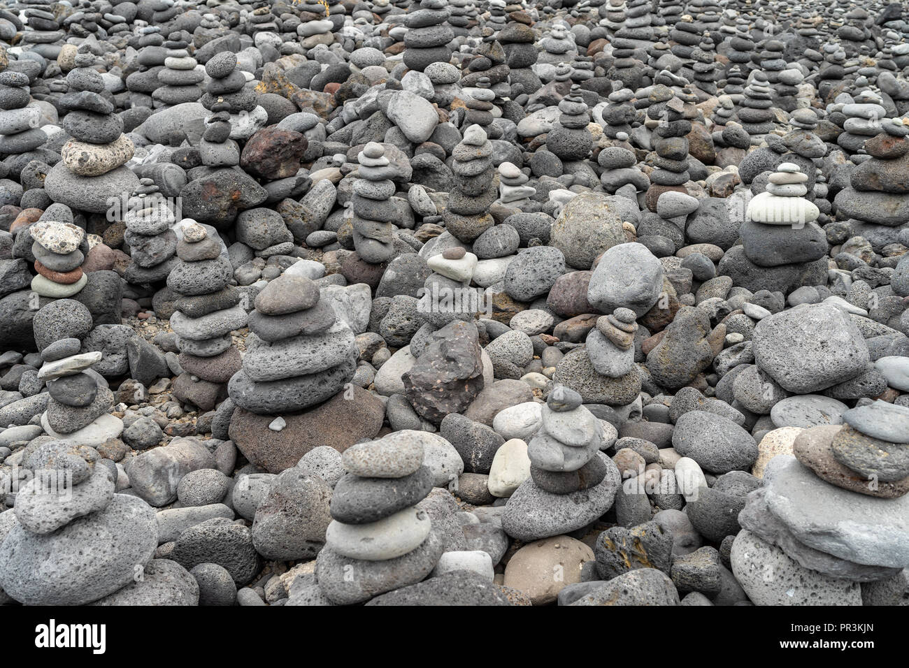 A pile of pebbles is built in the form of a pyramid Stock Photo - Alamy