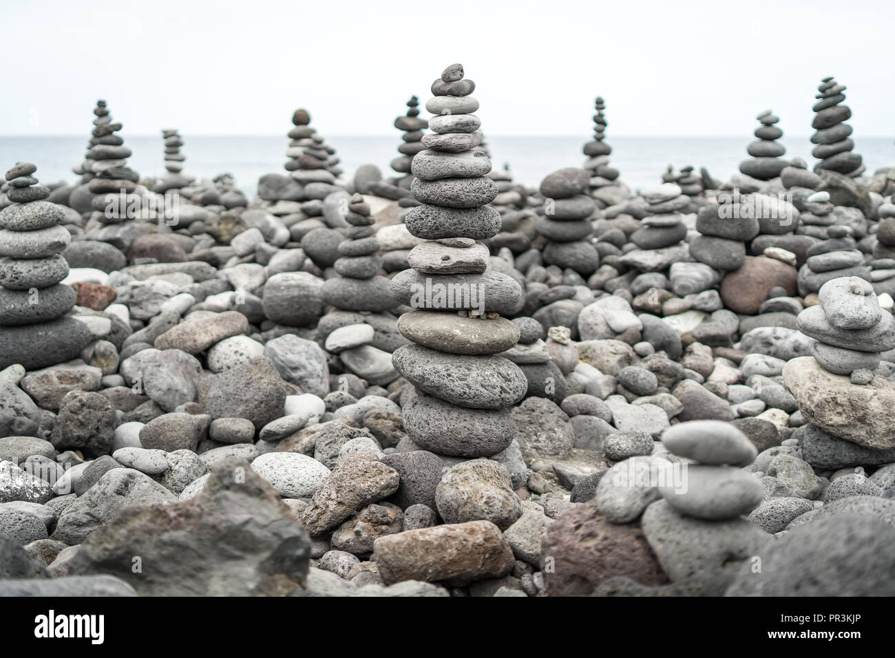 A pile of pebbles is built in the form of a pyramid Stock Photo - Alamy