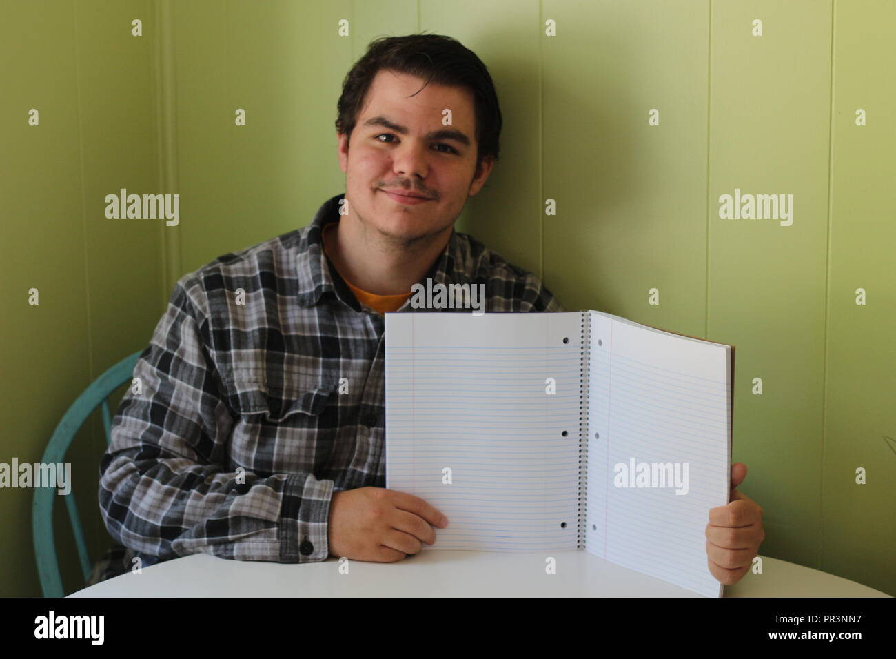 Person holding magazine front page hi-res stock photography and images ...