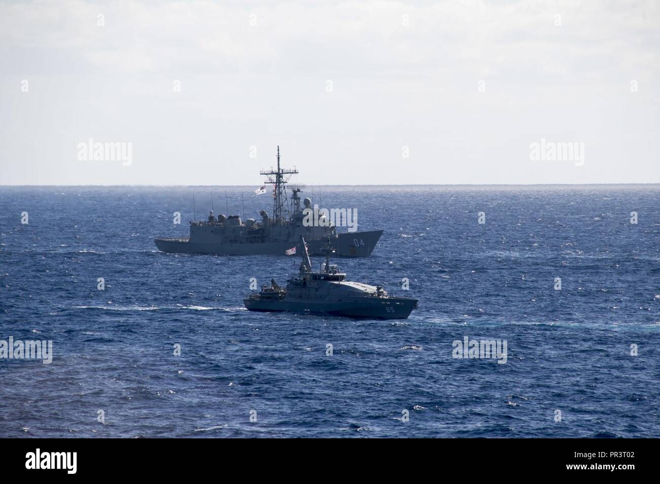 CORAL SEA (July 22, 2017) Patrol boat HMAS Bathurst (P85) and the long ...