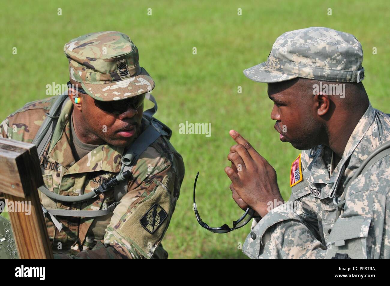 U.S. Army Reserve Spc. Matthew Roberts converses with his coach during ...