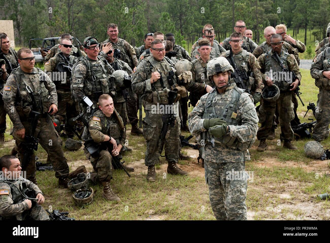 38th Infantry Division Command Sgt. Maj. James H. Martin talks to the ...
