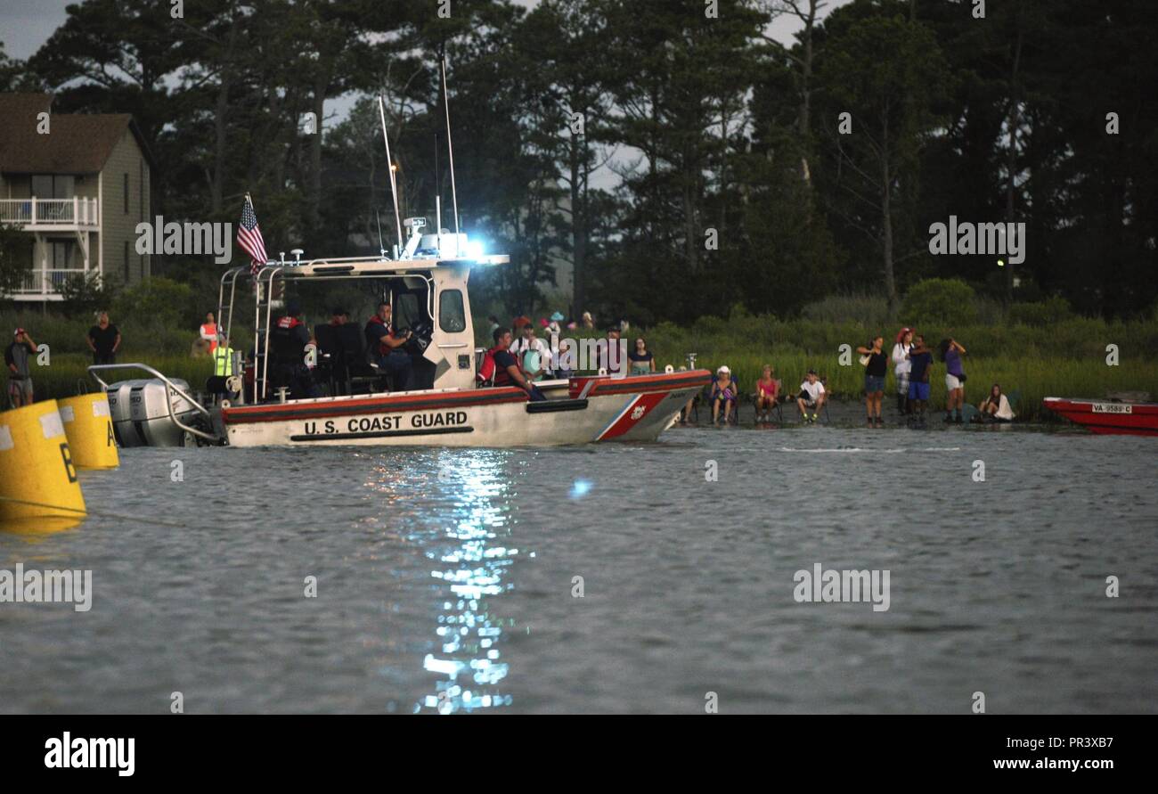 A Coast Guard 24-foot Special Purpose Craft-Shallow Water boat crew ...