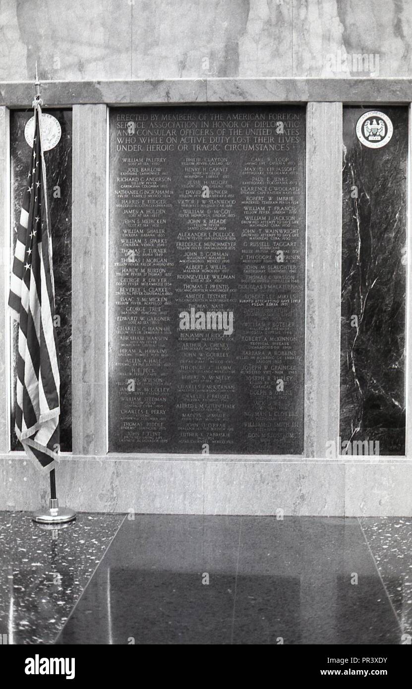 A USA FLAG NEXT TO A TRIBUTE TO AMERICAN FOREIGN SERVICE WORKERS ON THE ...